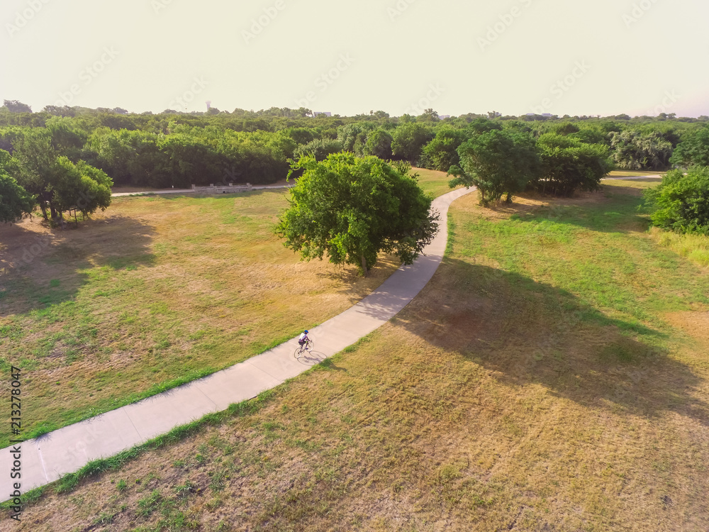 Top view park paved pathway with biker riding bike in Irving, Texas ...