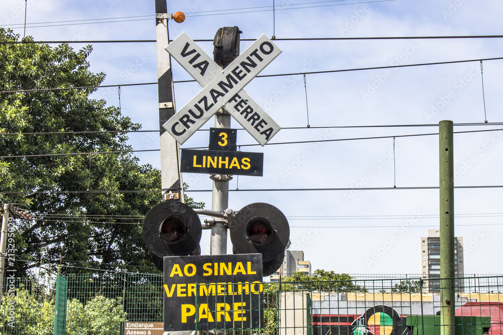 Stockfotot Level crossing between the street and railroad with traffic ...