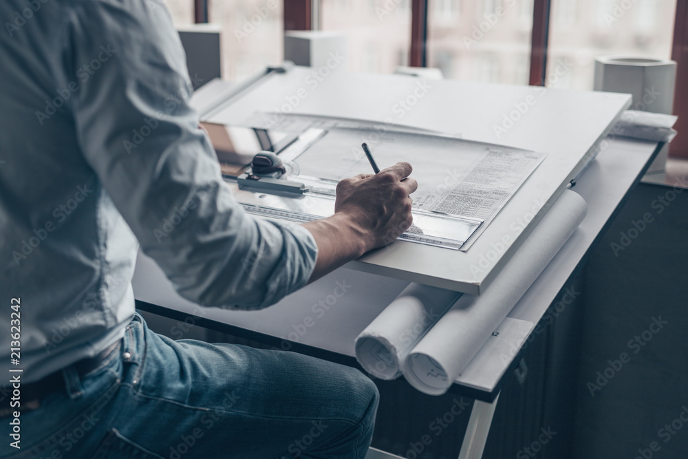 Young architect at work Stock Photo | Adobe Stock