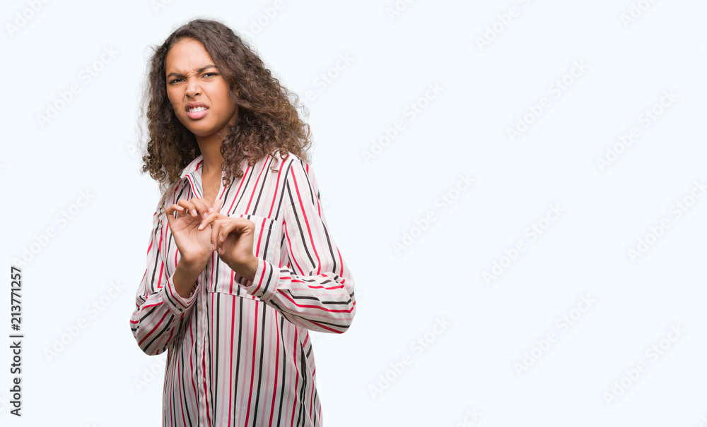 Beautiful young hispanic woman disgusted expression, displeased and ...