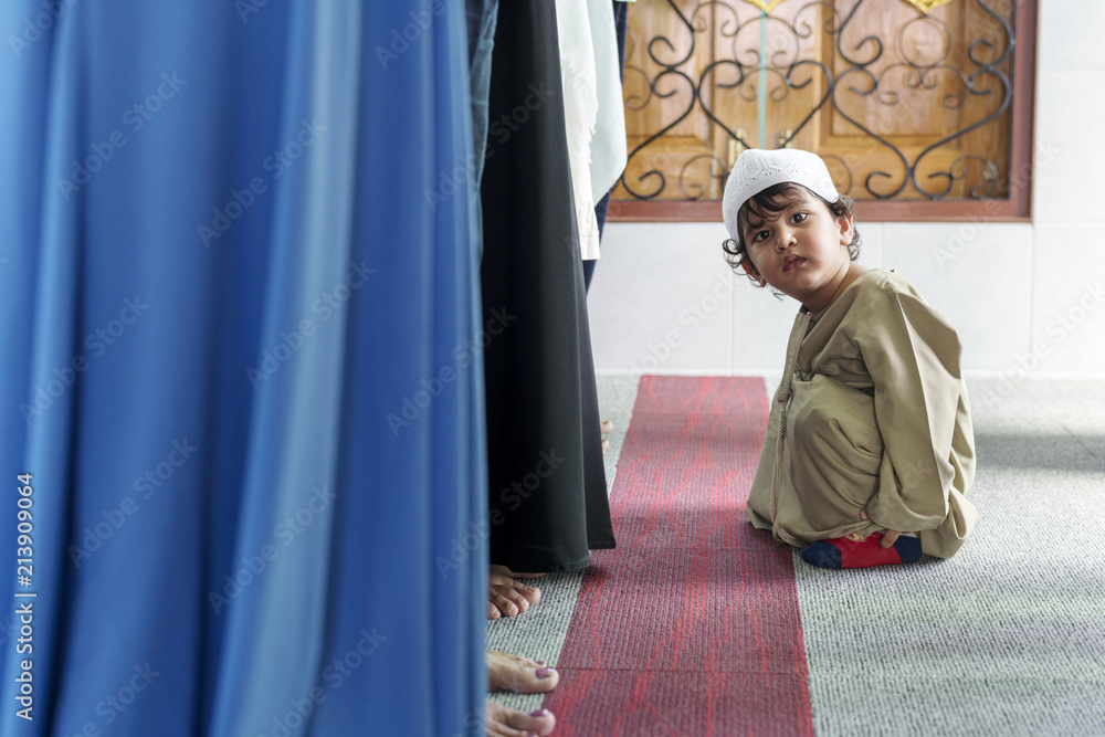 Muslim boy at the mosque Stock Photo | Adobe Stock