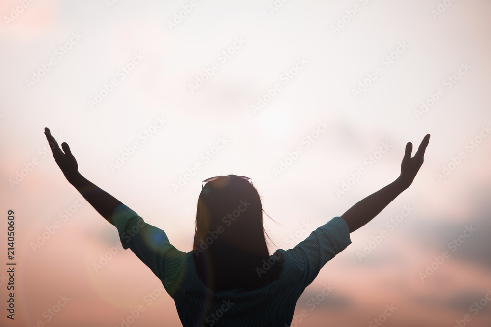 Photo Stock Women raised both hands up pray for blessings to God hands ...
