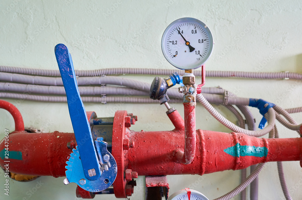 The pressure gauge shows the pressure in the pipeline colored red with ...