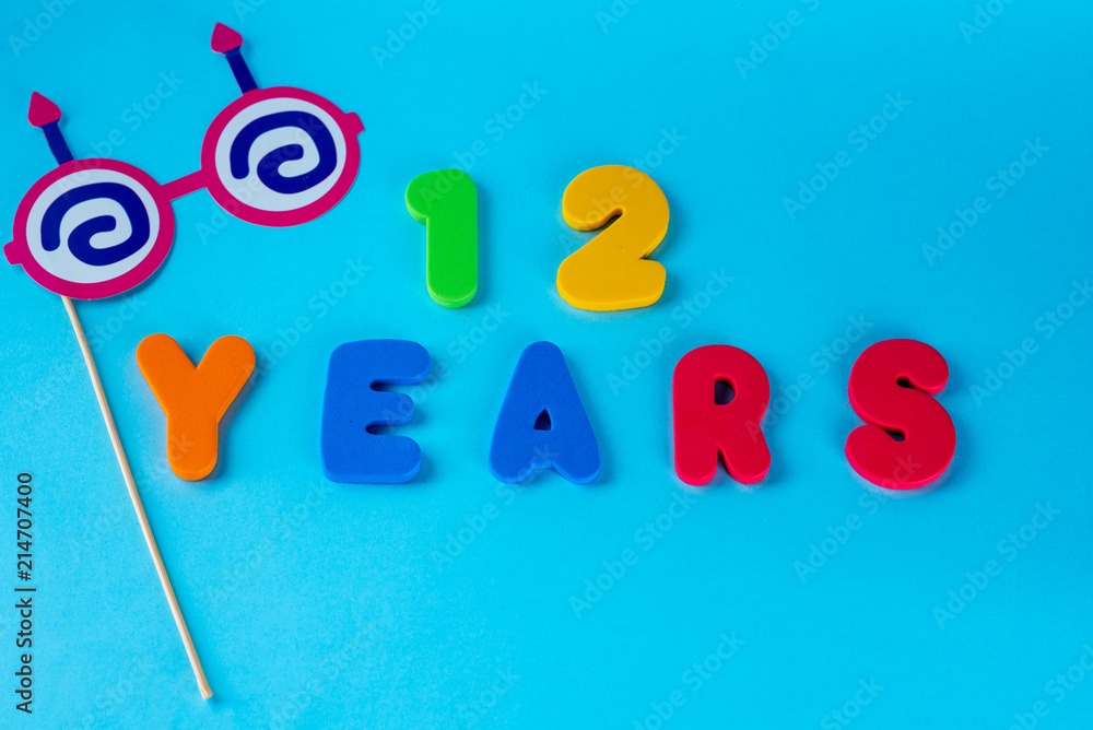 12 years old celebrating classic logo. Colored happy anniversary 12 th ...