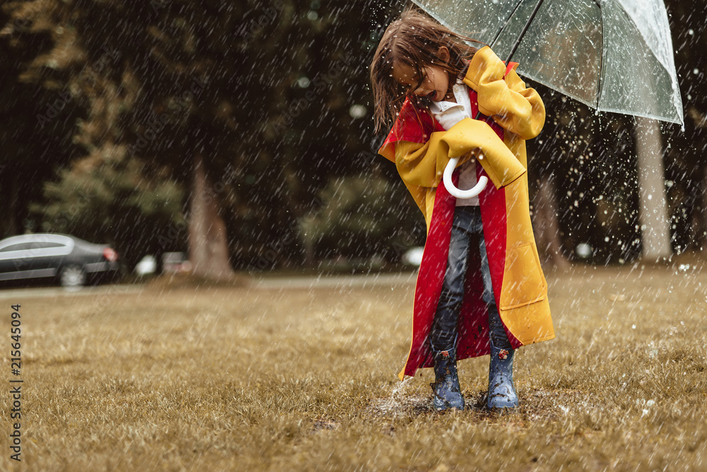 Stock-Foto „Careless childhood. Full length of happy kid holding ...