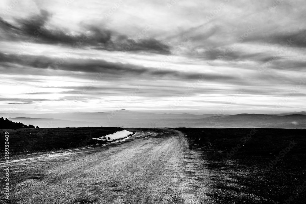 Subasio Mt. (Umbria, Italy), with sky covered by clouds and mist on the ...