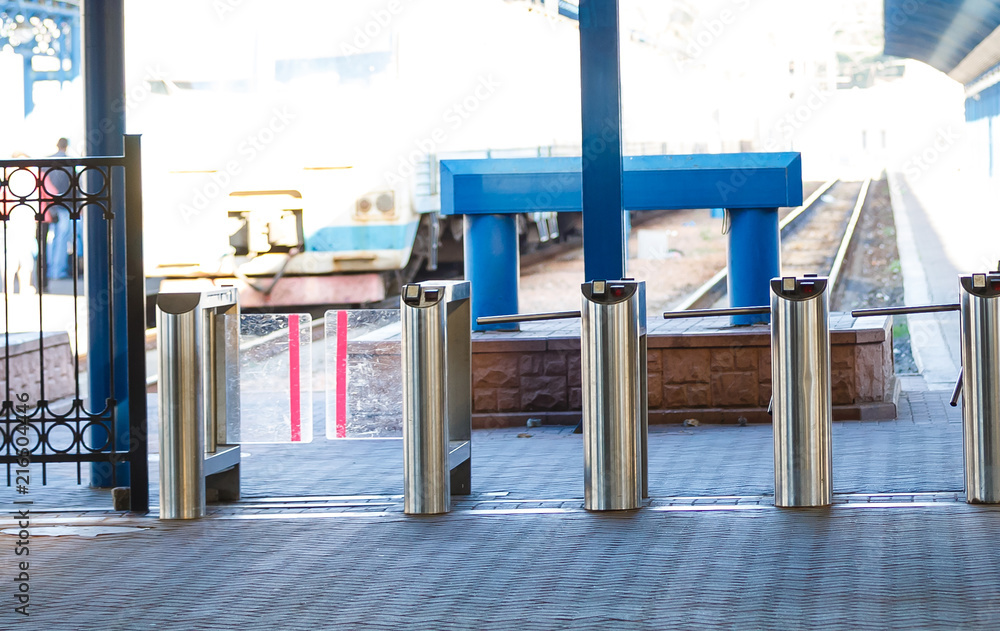 Closed entrance turnstile with access denied red sign. Security barrier ...