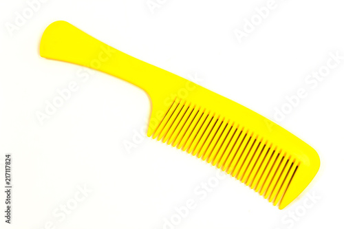 Plastic yellow comb isolated on white Stock Photo | Adobe Stock