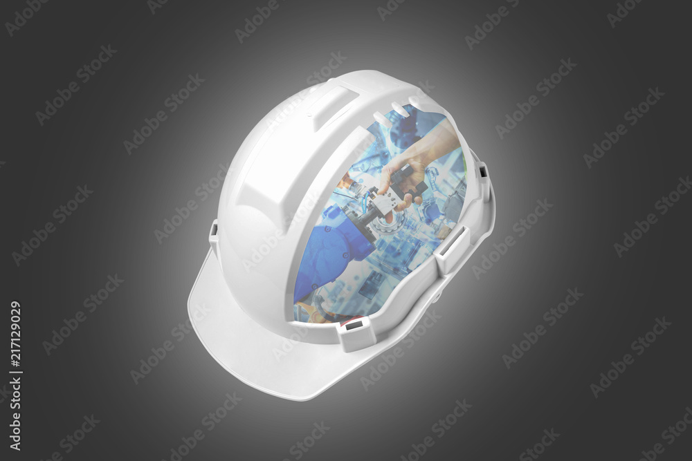 White engineer safety helmet mixed handshake of robotic and human join ...