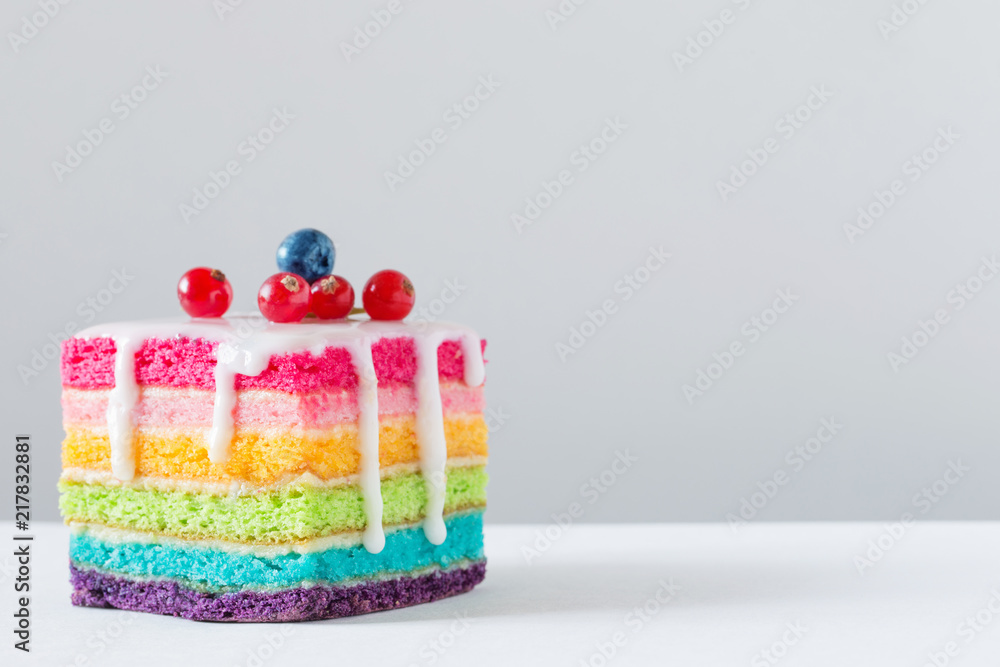 rainbow cake on white background Stock Photo | Adobe Stock