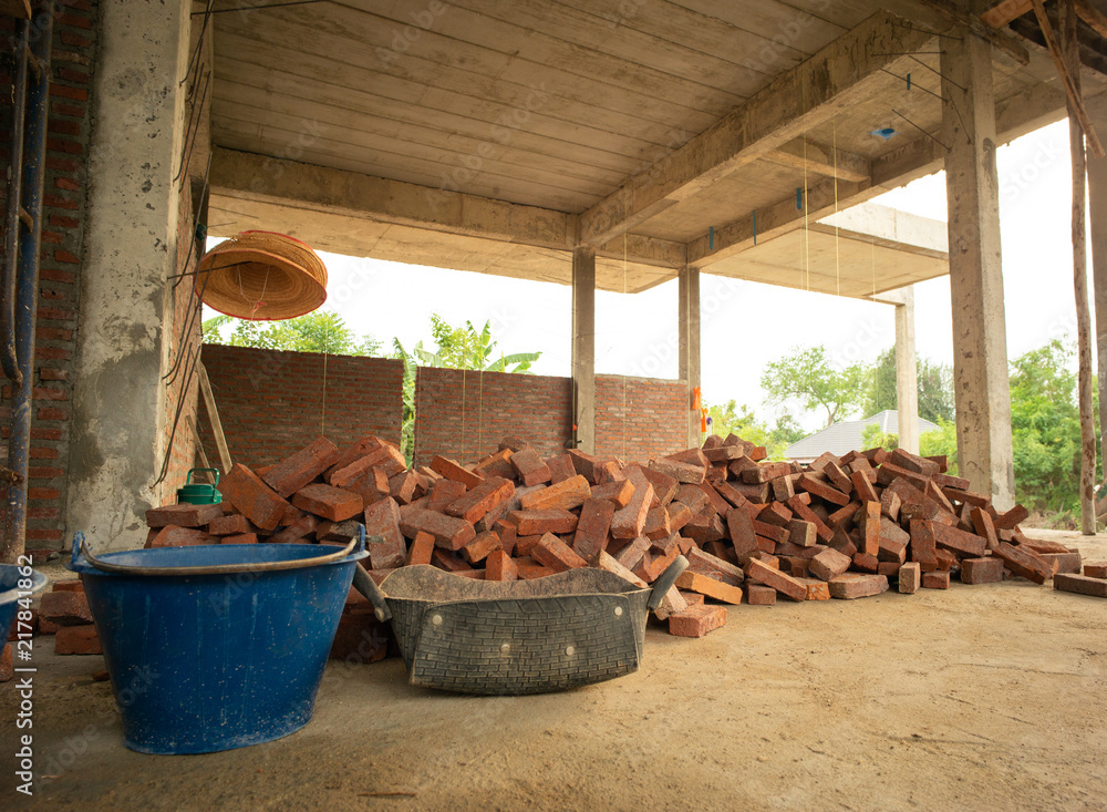 Pile of red brick stand by for installing to the wall Stock Photo ...
