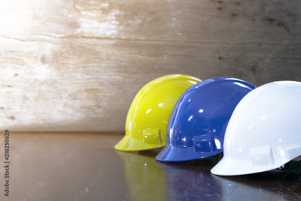 Engineer, electrician and worker 's helmet color as White, Blue and ...