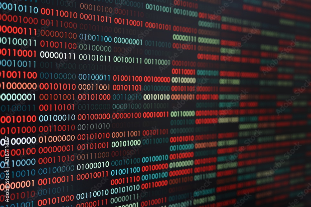 Computer virus infection. Row of binary codes randomly colored red and ...