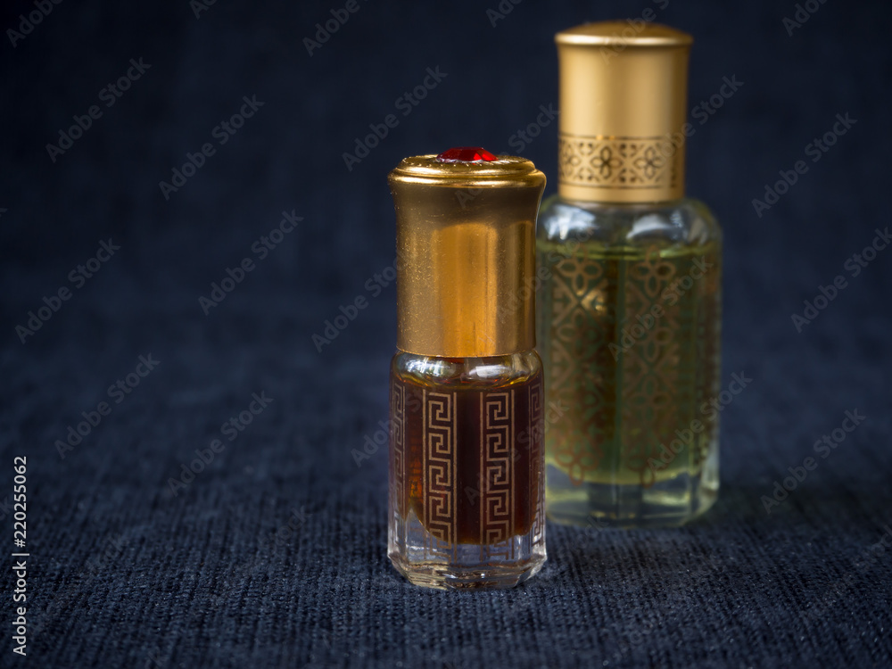 Arabian oud attar perfume or agarwood oil fragrances in mini bottles ...