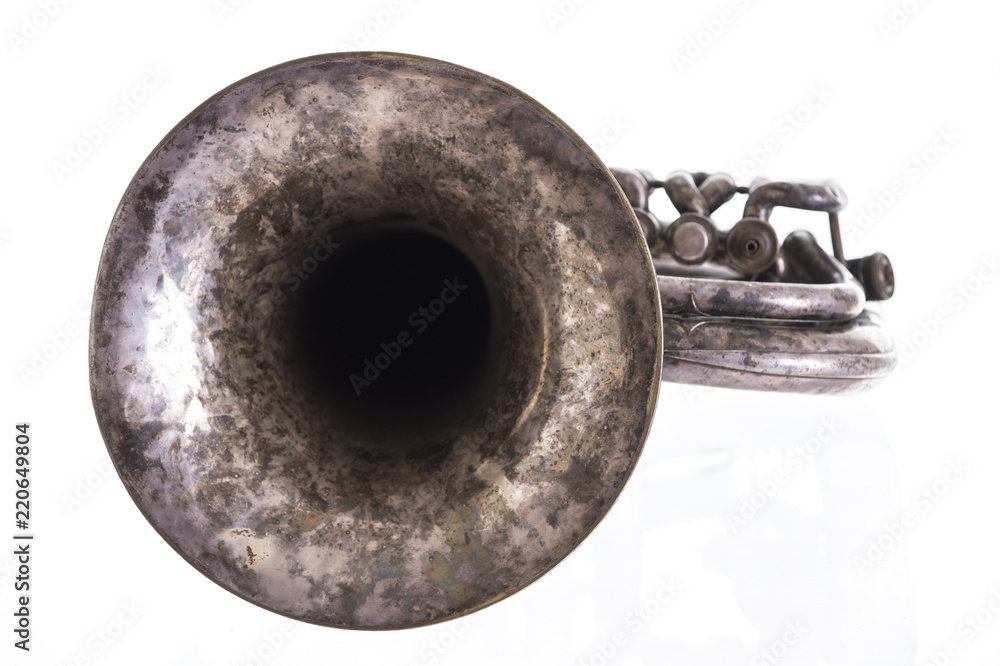 old musical wind instrument isolated on white background, chrome-plated ...