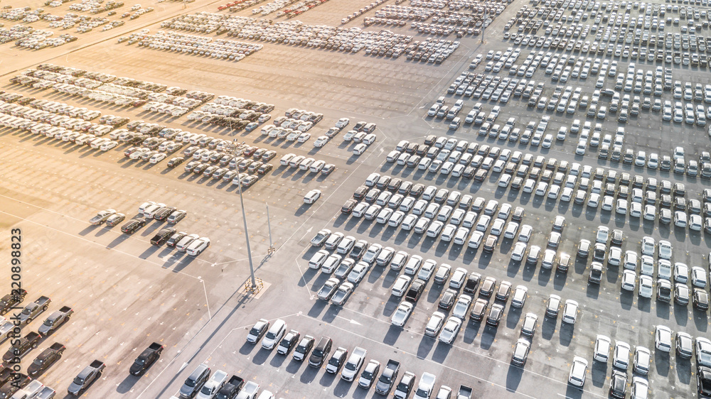 Aerial view new cars lined up at distribution centre. Cars distribution ...