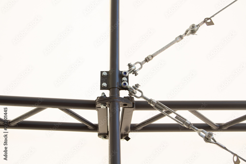 Attaching and tensioning steel cables. Fixation of steel cables using ...