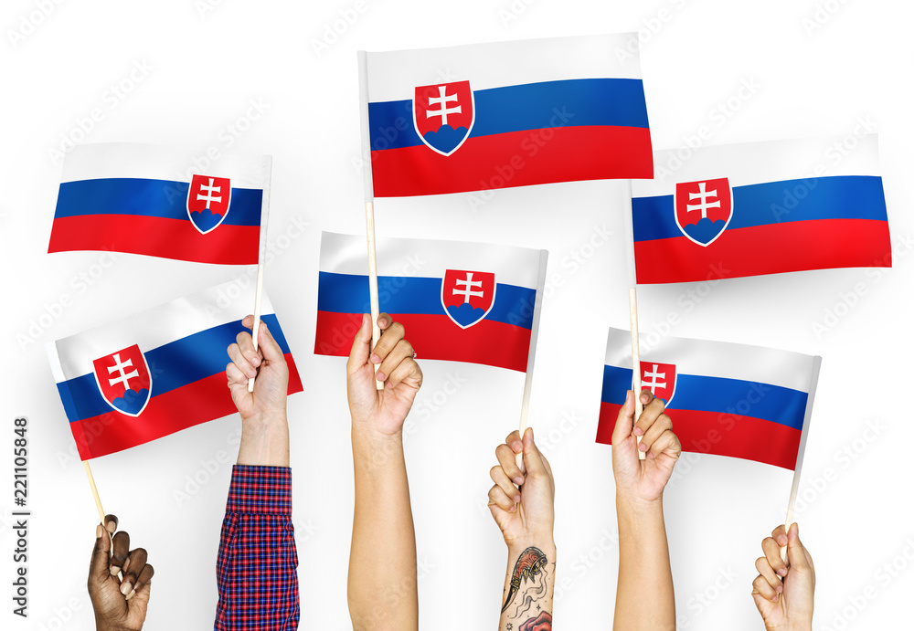 Hands waving flags of Slovakia Stock Photo | Adobe Stock