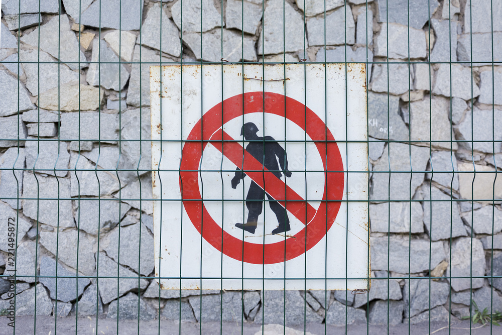 Prohibition sign. There is no passage, people are forbidden to walk ...