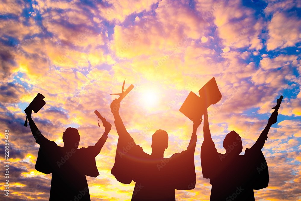 Photo Stock Silhouette of Student Graduation. They are seeing sunset ...