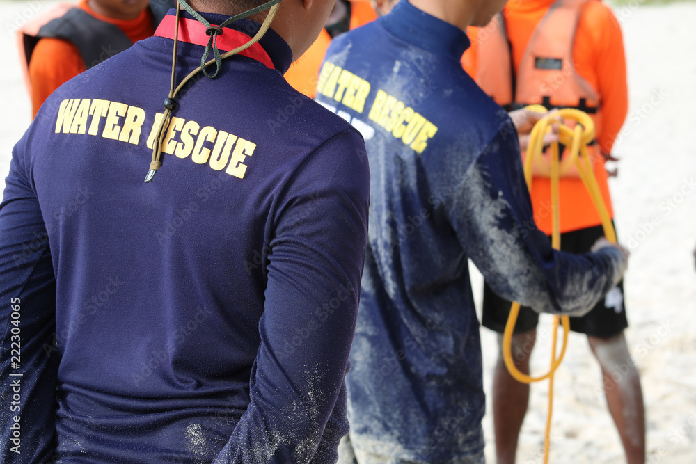Rescue training to help the victims with a rope on the beach for ...