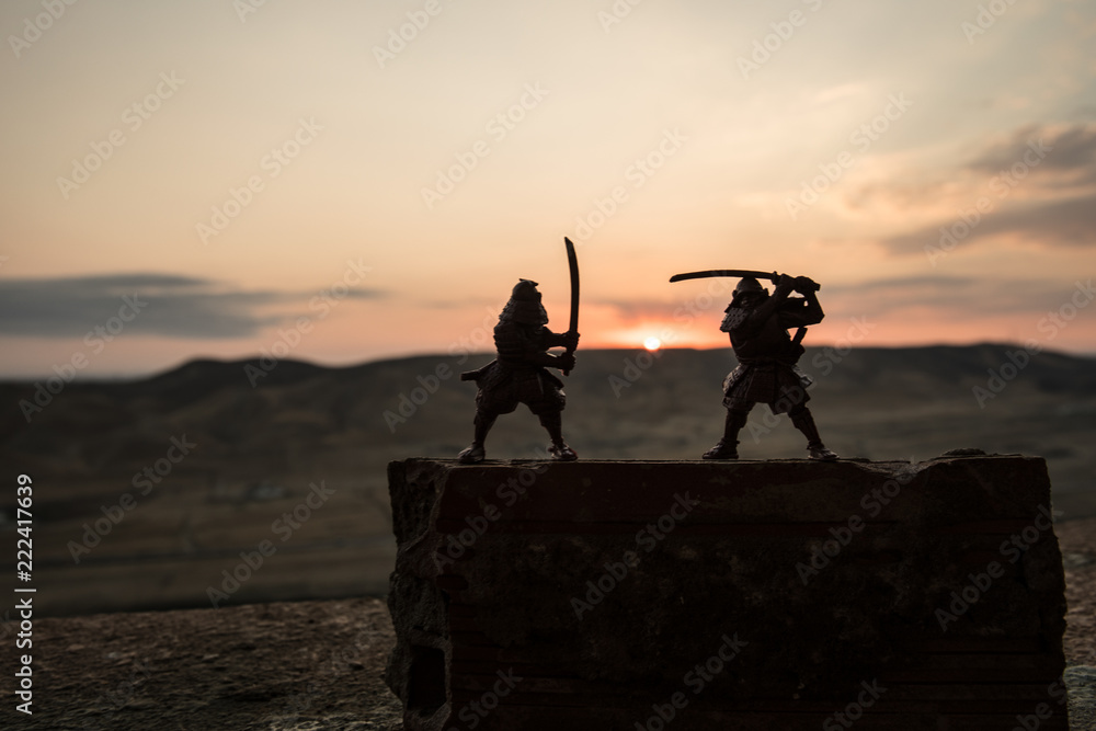 Silhouette of two samurais in duel. Picture with two samurais and ...