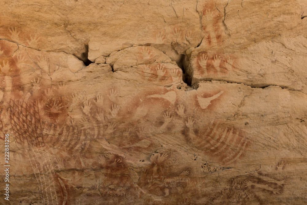 Aboriginal stencil rock art of hands, nets and stone axes at Cathedral ...