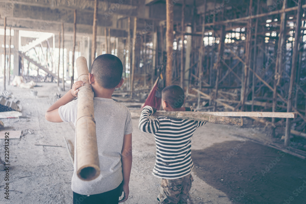 Little boys labor working in commercial building structure, World Day ...