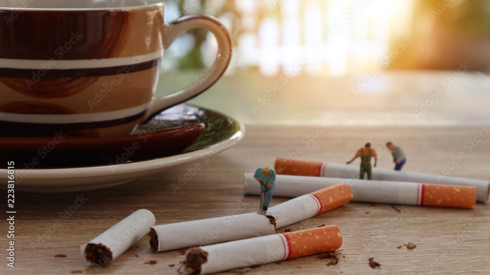 Miniature stop smoking concept, Group of miniature mini figures with ...