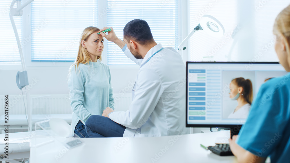 Plastic / Cosmetic Surgeon with Female Patient, He Draws Lines on Her ...