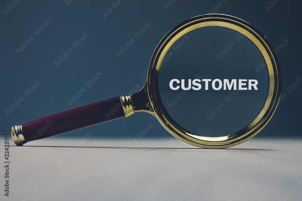 Magnifying glass with word Customer. Stock Photo | Adobe Stock