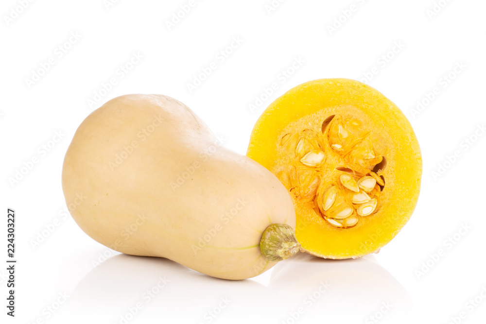 Group of one whole one slice of smooth pear shaped orange butternut ...