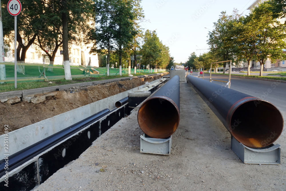 Replacement pipes in the city.Construction of heating mains for ...