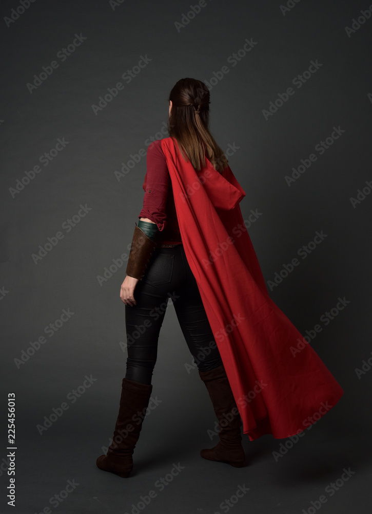 full length portrait of brunette girl wearing red medieval costume and ...