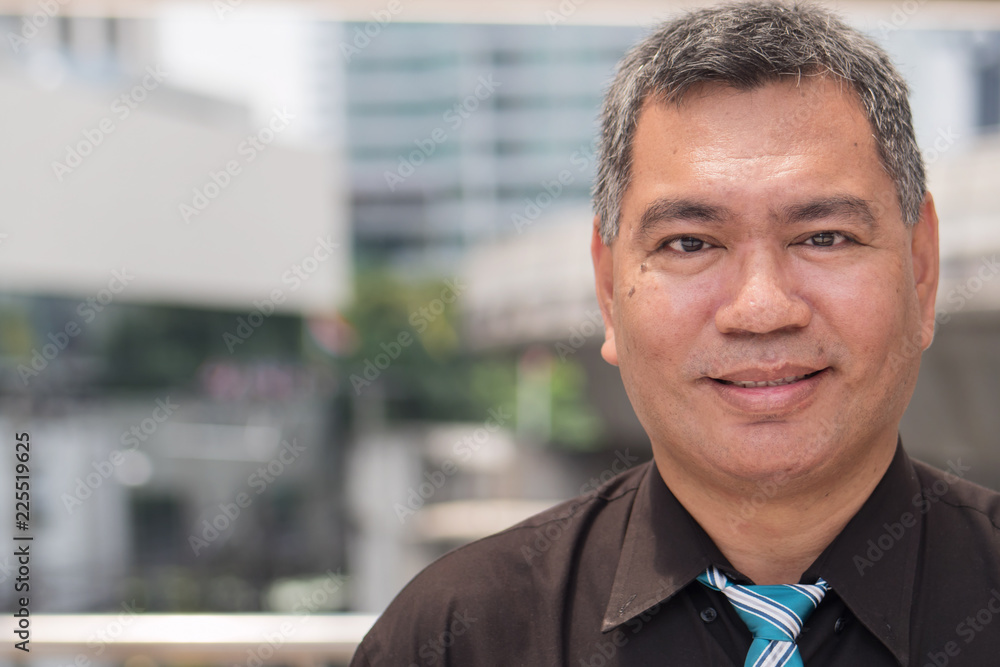 old south east asian business man face; portrait of happy smiling old ...