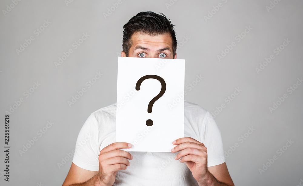 Foto Question mark, symbol. Pensive male. Man a question. Doubtful man ...