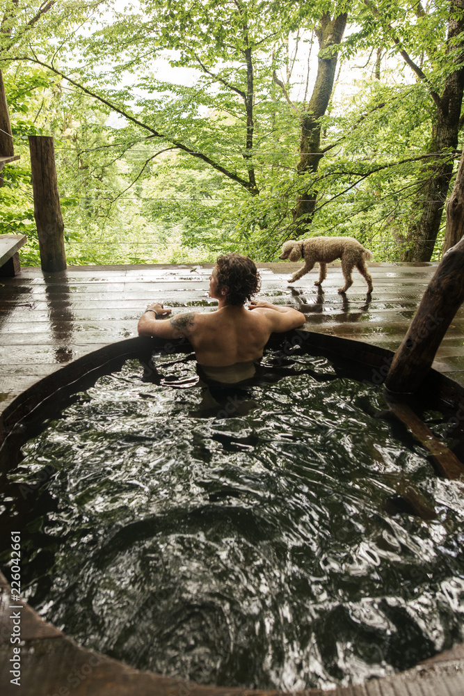 brutal, strong man enjoying the beauty of breathtaking scenery while ...