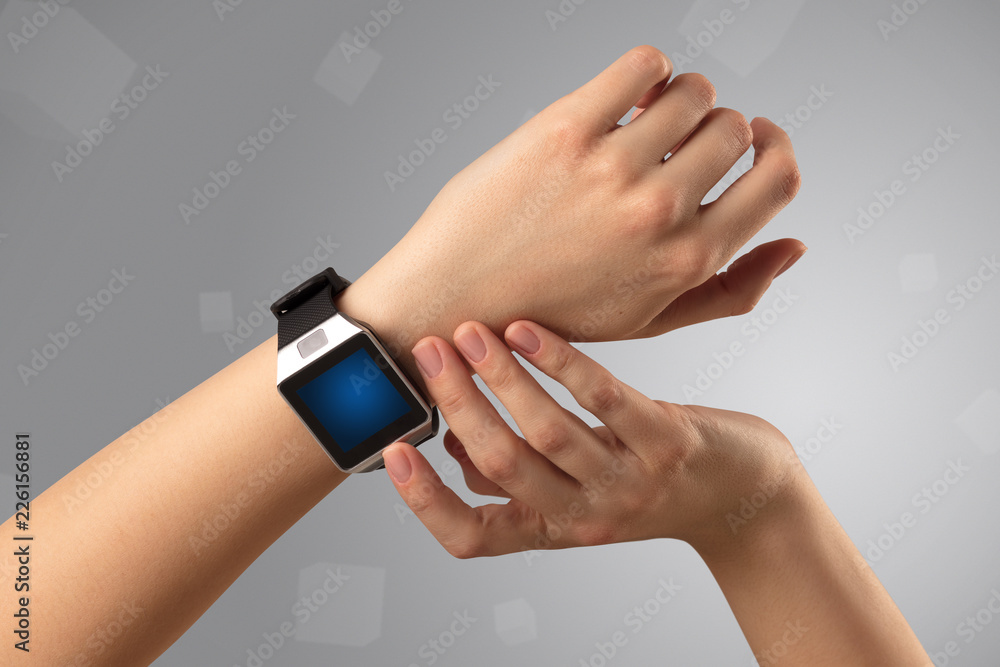 Female hand wearing smartwatch with free space on the screen Stock ...