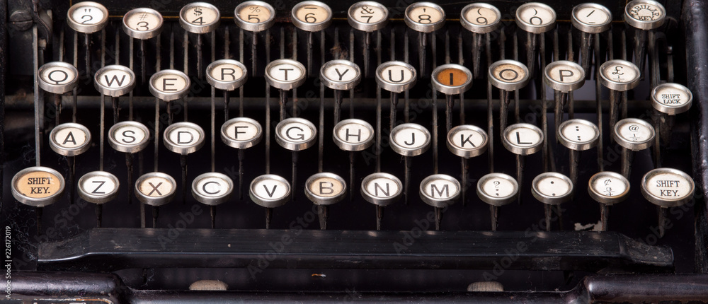 Row of keys on an old typewriter Stock Photo | Adobe Stock