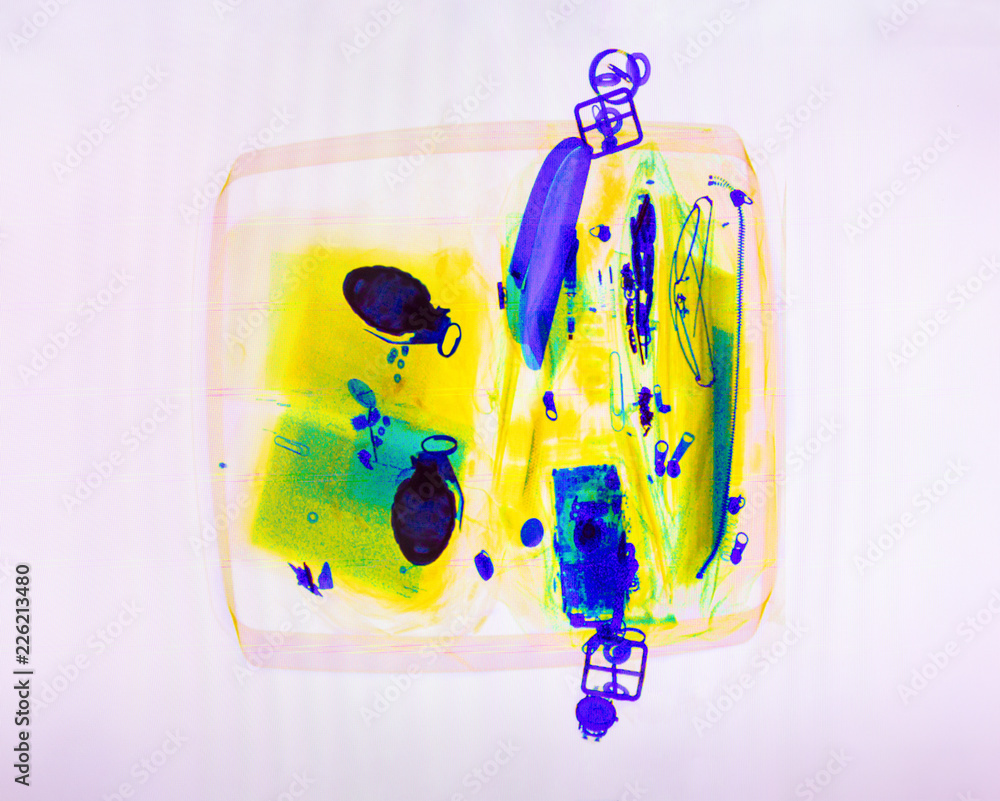 Scanned baggage with bomb on the x-ray scanner screen in the airport ...