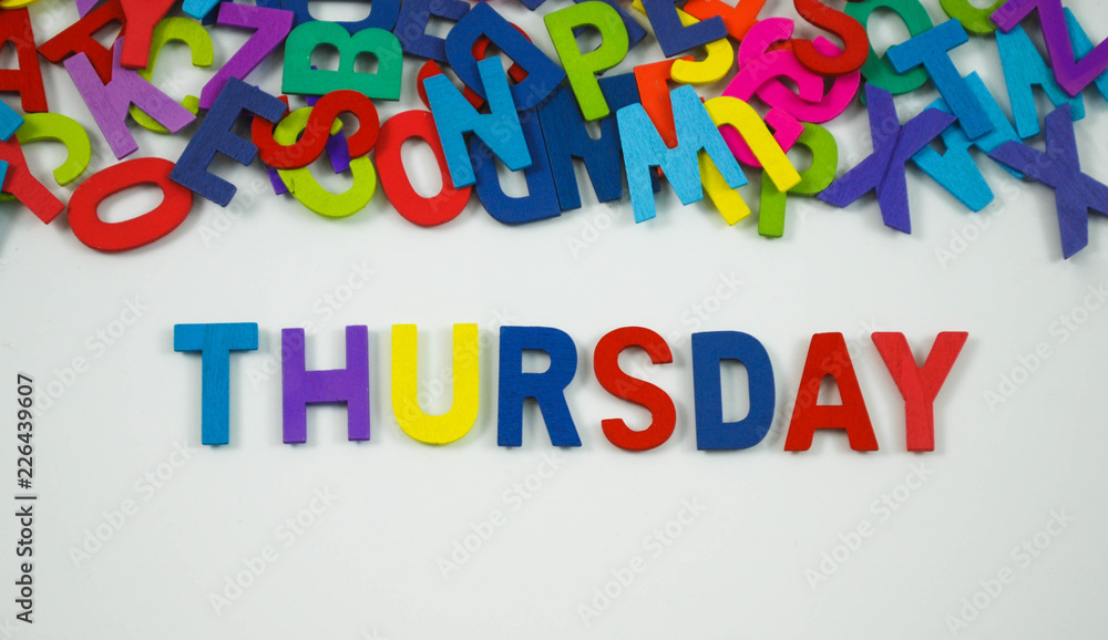 Colorful wooden alphabet wit text thursday Stock Photo | Adobe Stock