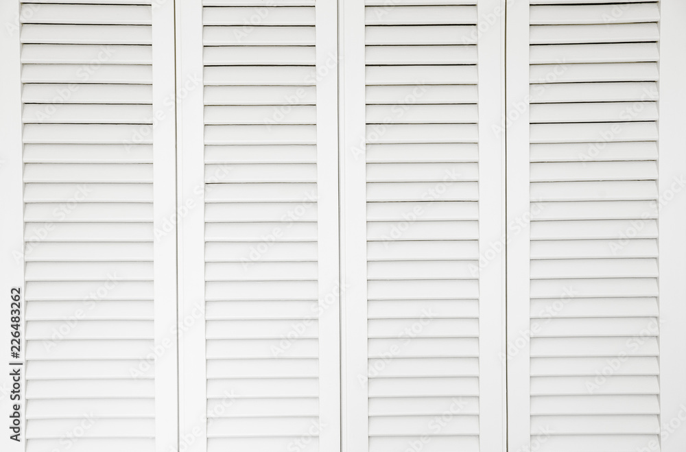 Plantation style white window sun shutters. Background concept. Stock ...