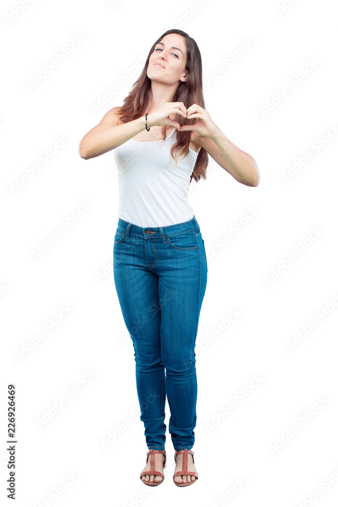 young pretty girl full body standing sideways, smiling, looking happy ...