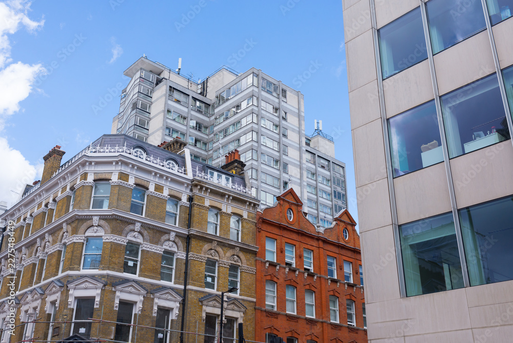 High rise block modern buildings mixed with old restored Victorian ...