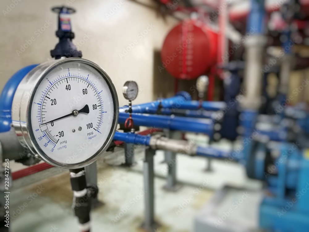Pressure gauge in Pump room with blurred background Stock Photo | Adobe ...