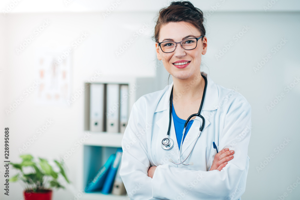 Portrait of Woman Doctor at her Medical Office Stock Photo | Adobe Stock