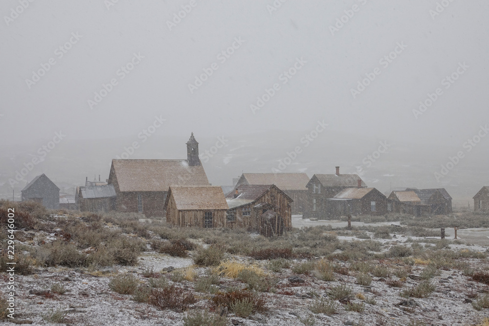 Cold winter weather gathers over an abandoned mining town in Sierra ...