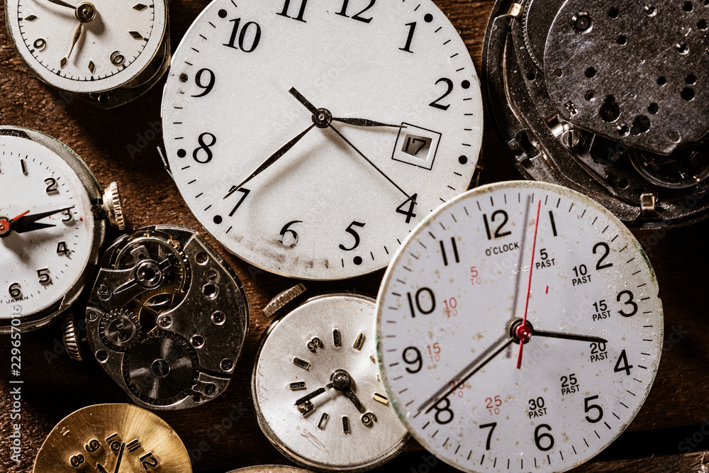 Old, vintage watch faces making a background. Time concept Stock Photo ...