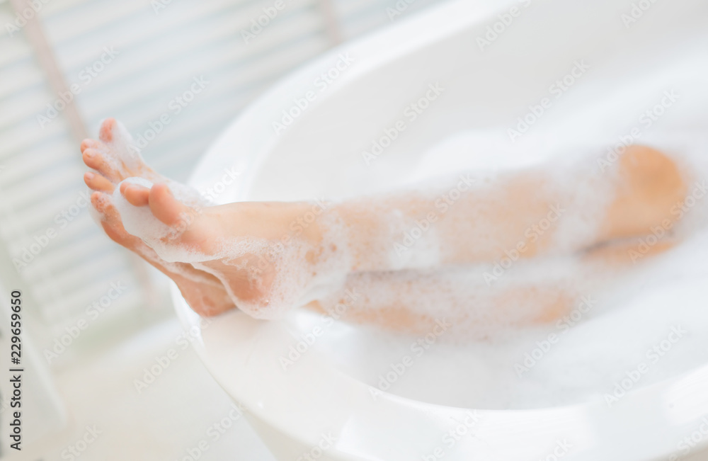 Women's feet she was bathing in a a bathtub with happiness Stock Photo ...