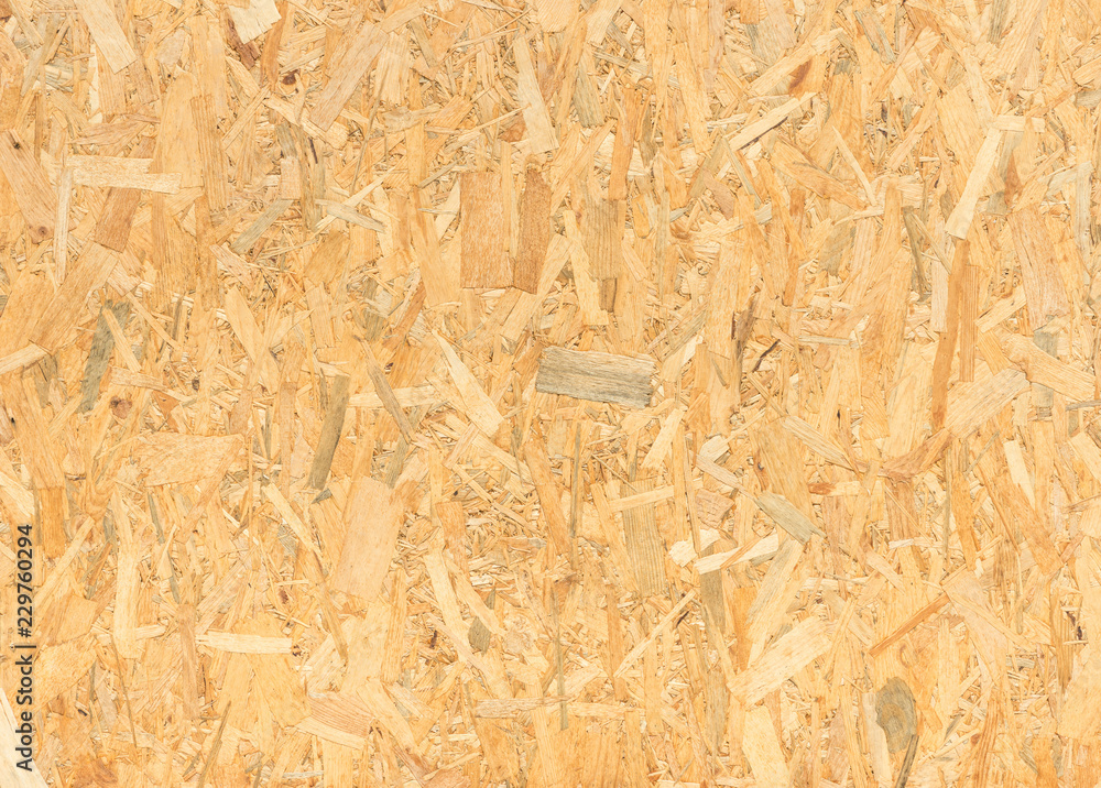 pressed wooden panel background, seamless texture of oriented strand ...
